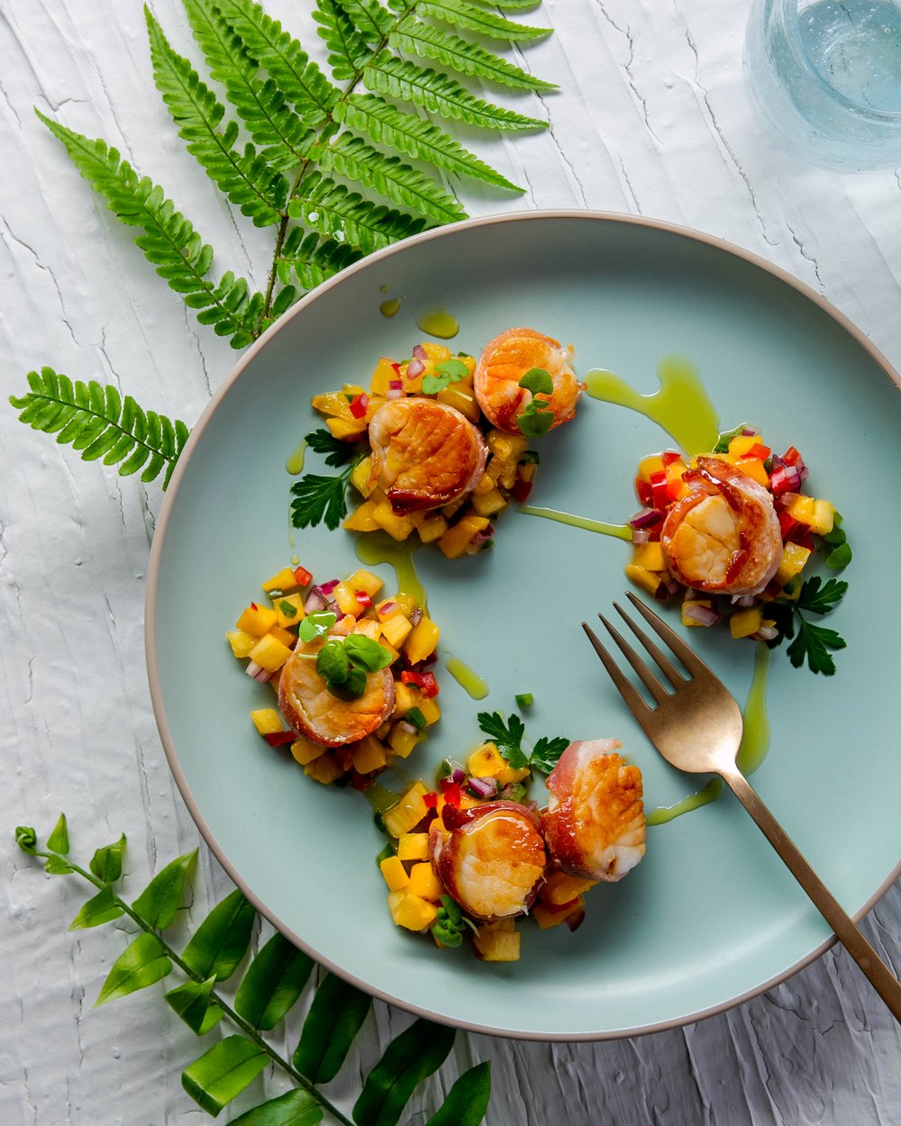 Bacon Wrapped Scallops with Mango & Pineapple Salsa - Table Magazine